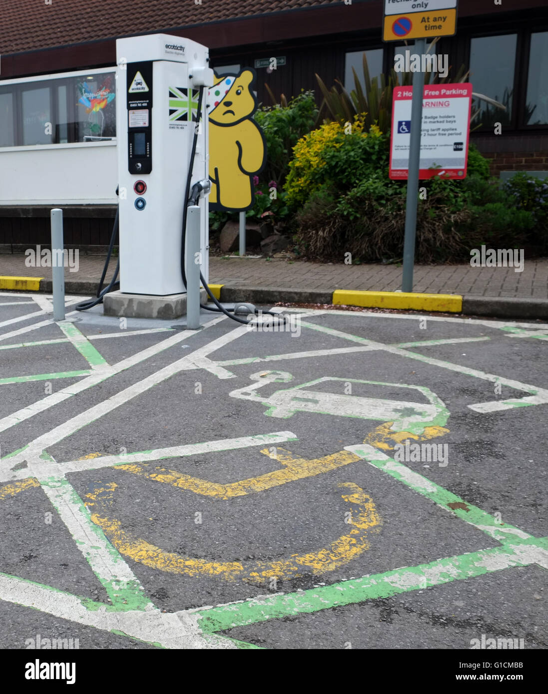 Disabled car parking bay painted out in favor of an electric car ...