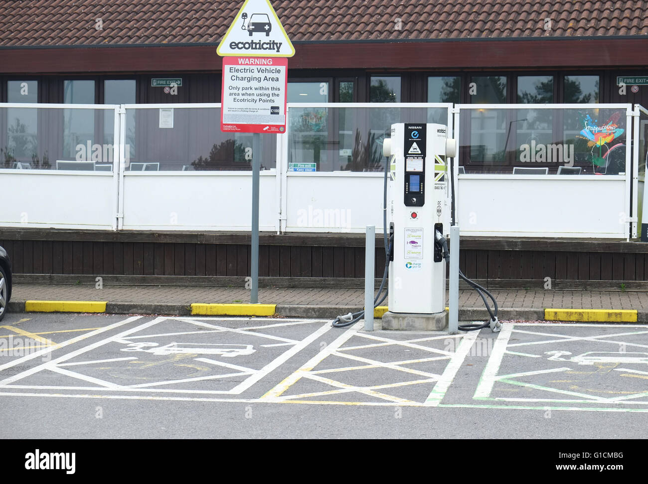 Disabled car parking bay painted out in favor of an electric car ...