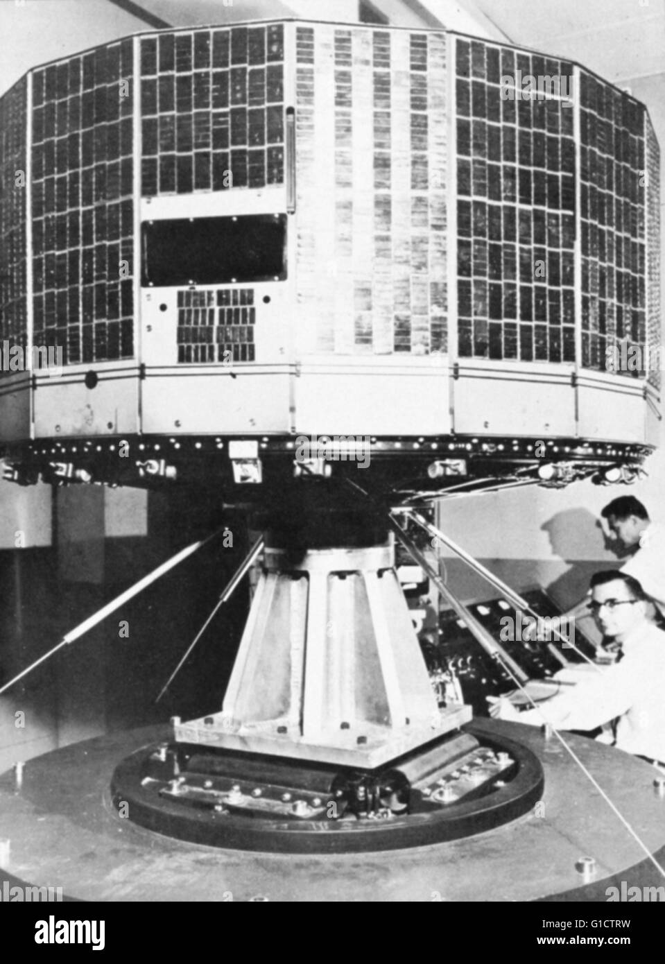 TIROS I satellite on test stand during preliminary test stage. In ...