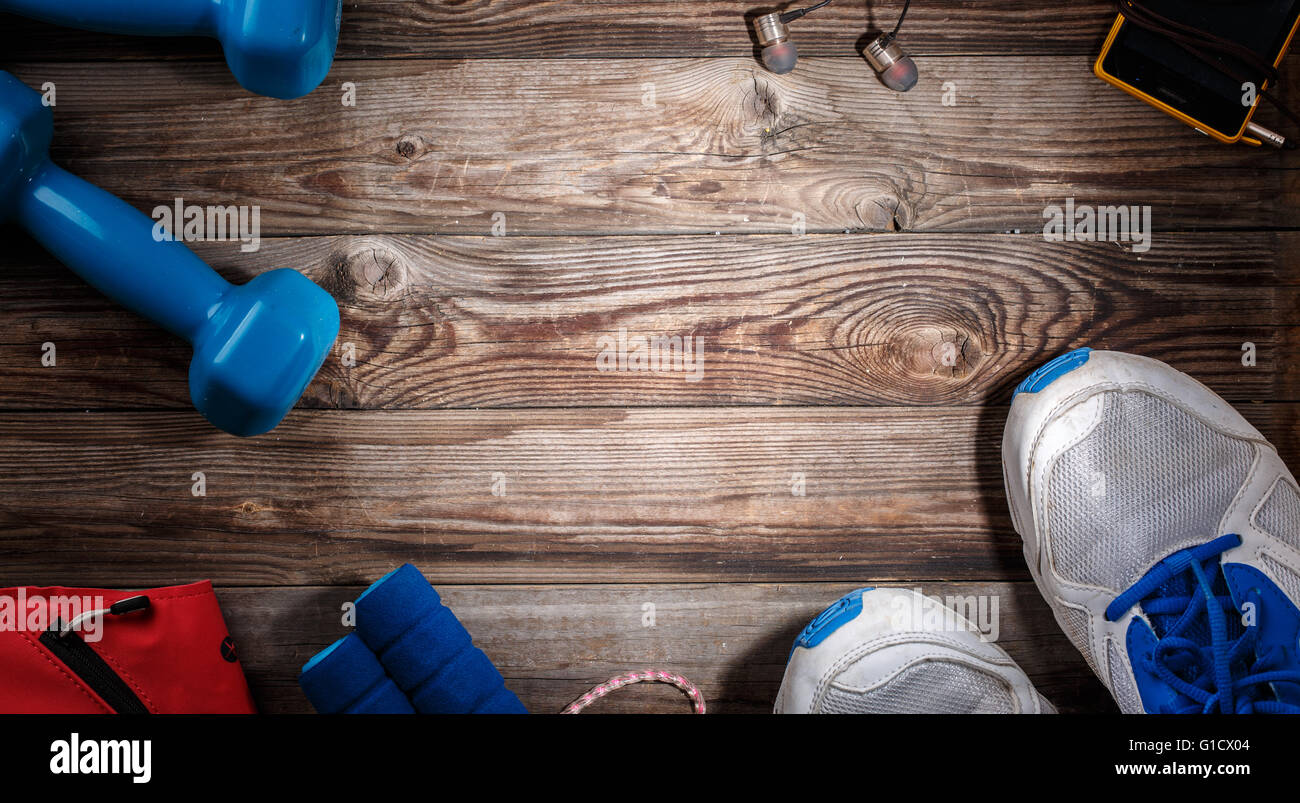 Sport stuff on wooden table, top view Stock Photo - Alamy