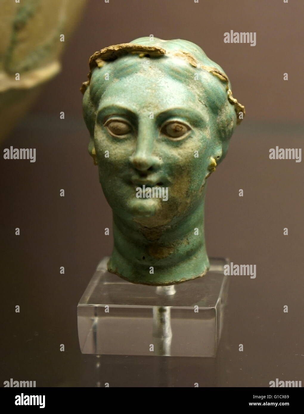 Faience head of Arsinoe II from Naukratis, Egypt. Dated 3rd Century BC ...