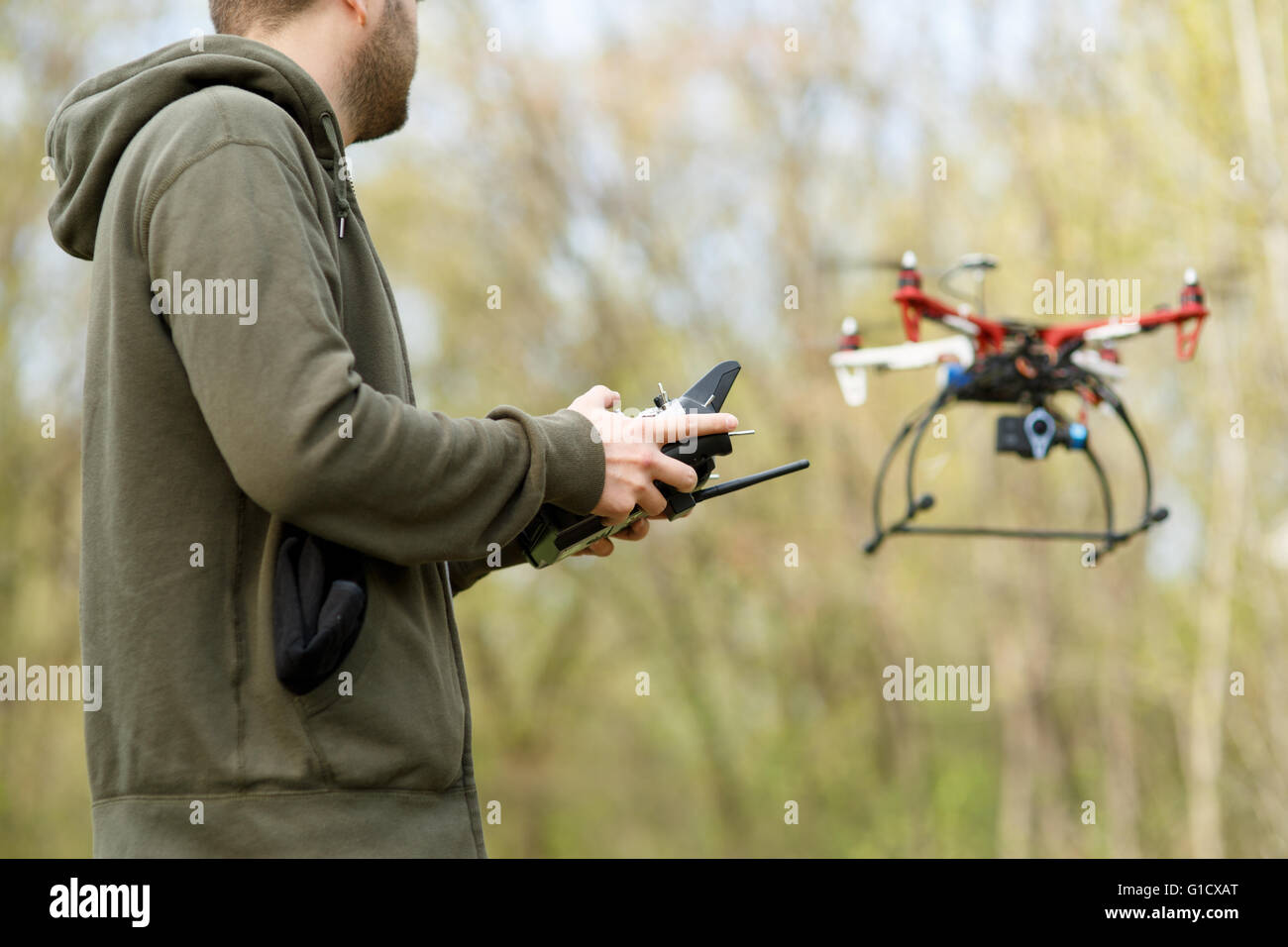 Man controling a drone Stock Photo - Alamy