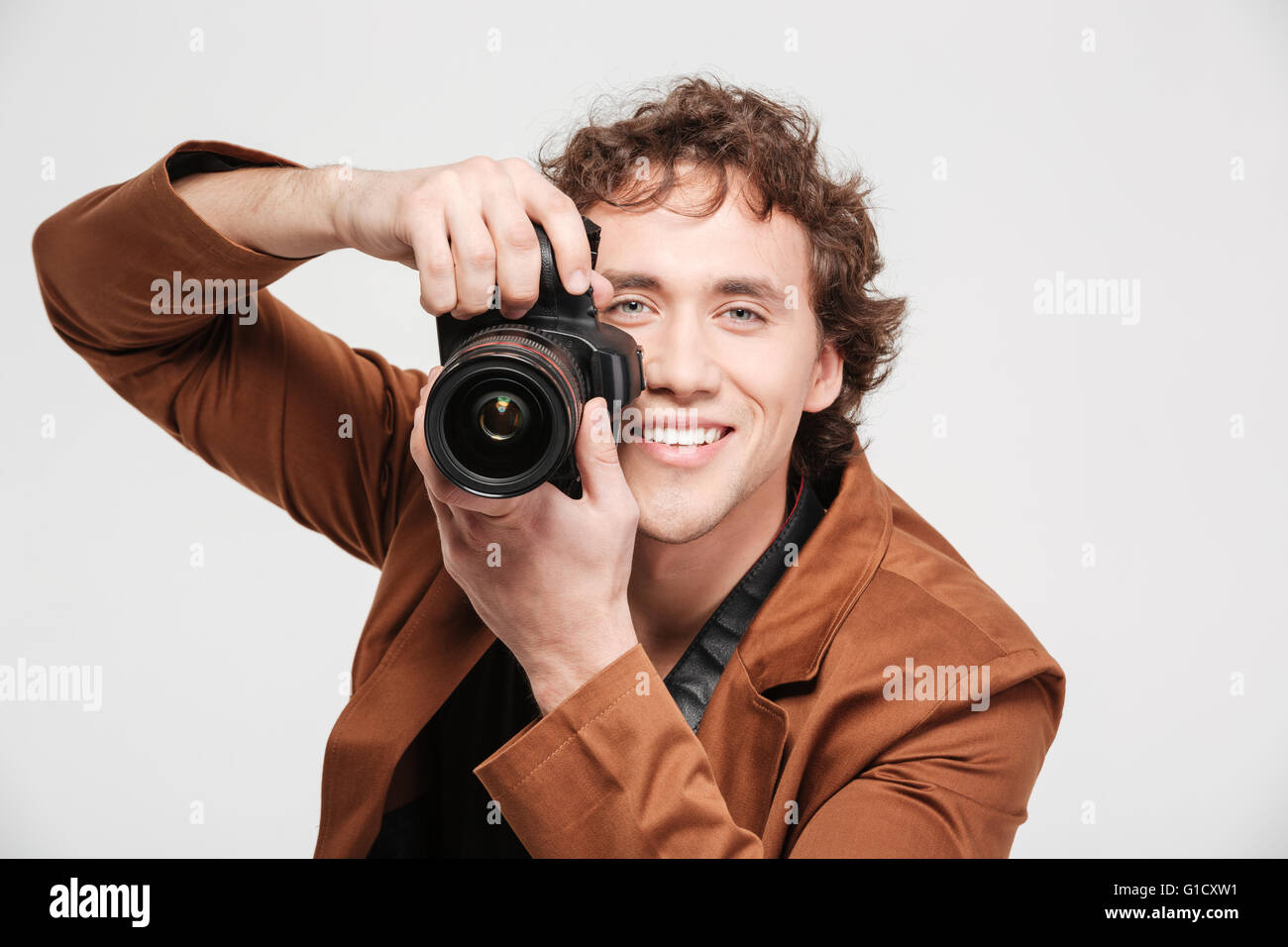 Handsome photographer dslr isolated on hi-res stock photography and ...