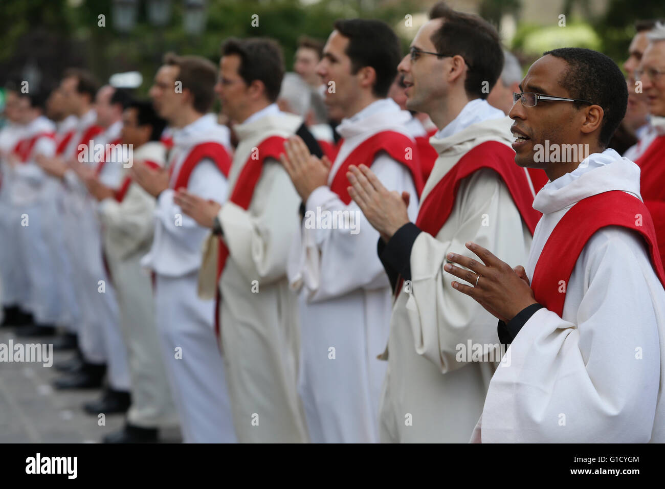 Priest singing hi-res stock photography and images - Alamy