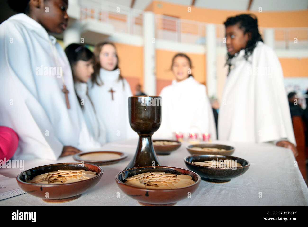 Notre-Dame-du-Val church. Catholic sunday mass. Altar servers and ...
