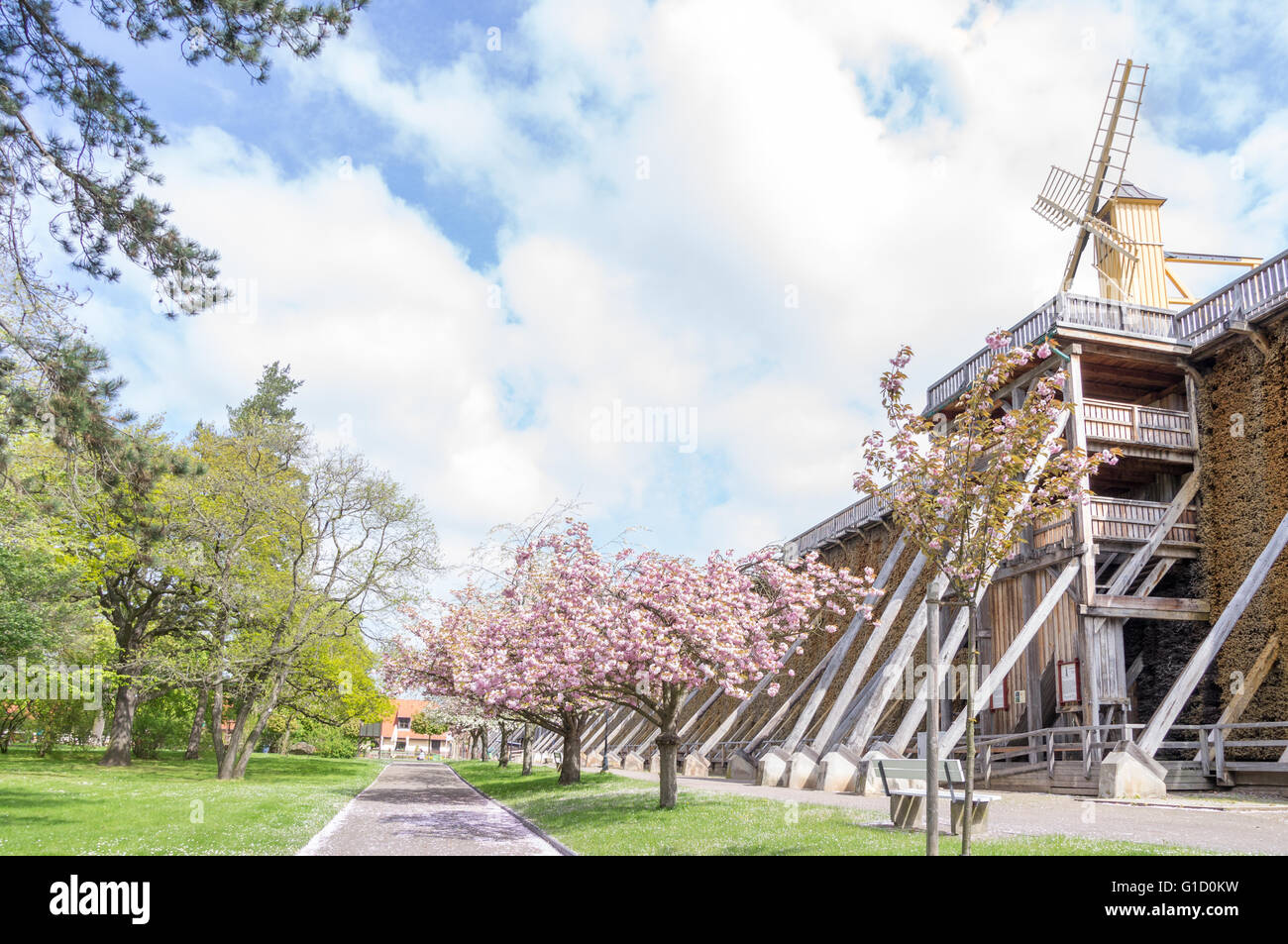 spa garden and graduation house with windmill in spring Stock Photo - Alamy