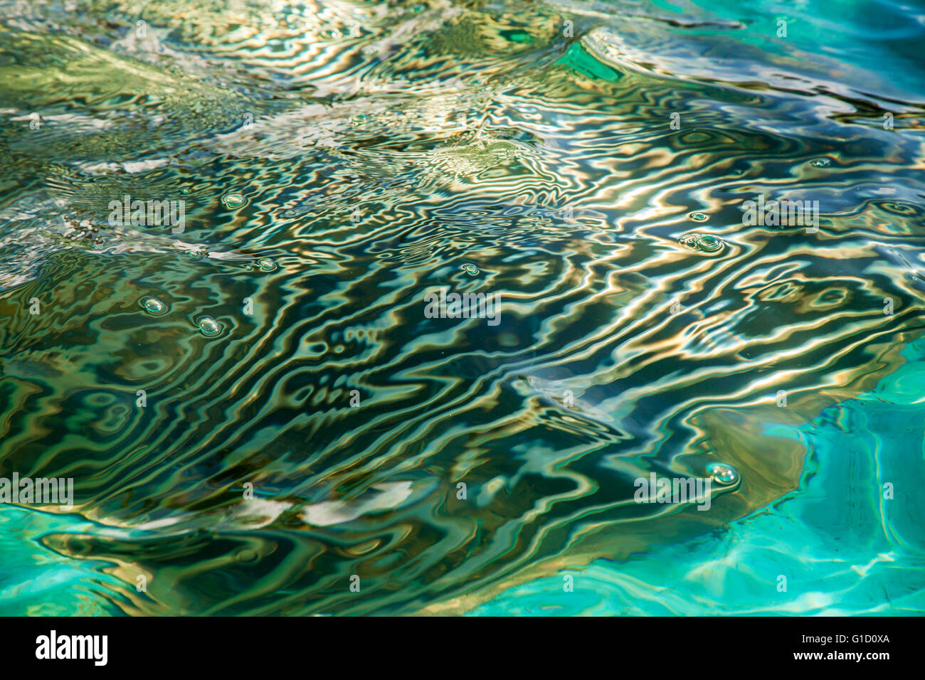 abstract bright multicoroled reflection in water Stock Photo - Alamy