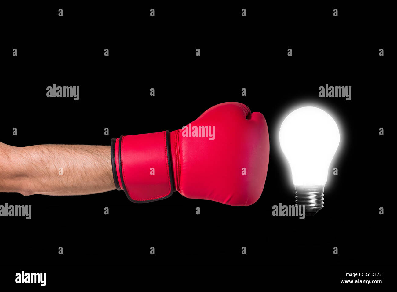 Boxing glove and a lamp in a same frame on a black background Stock ...