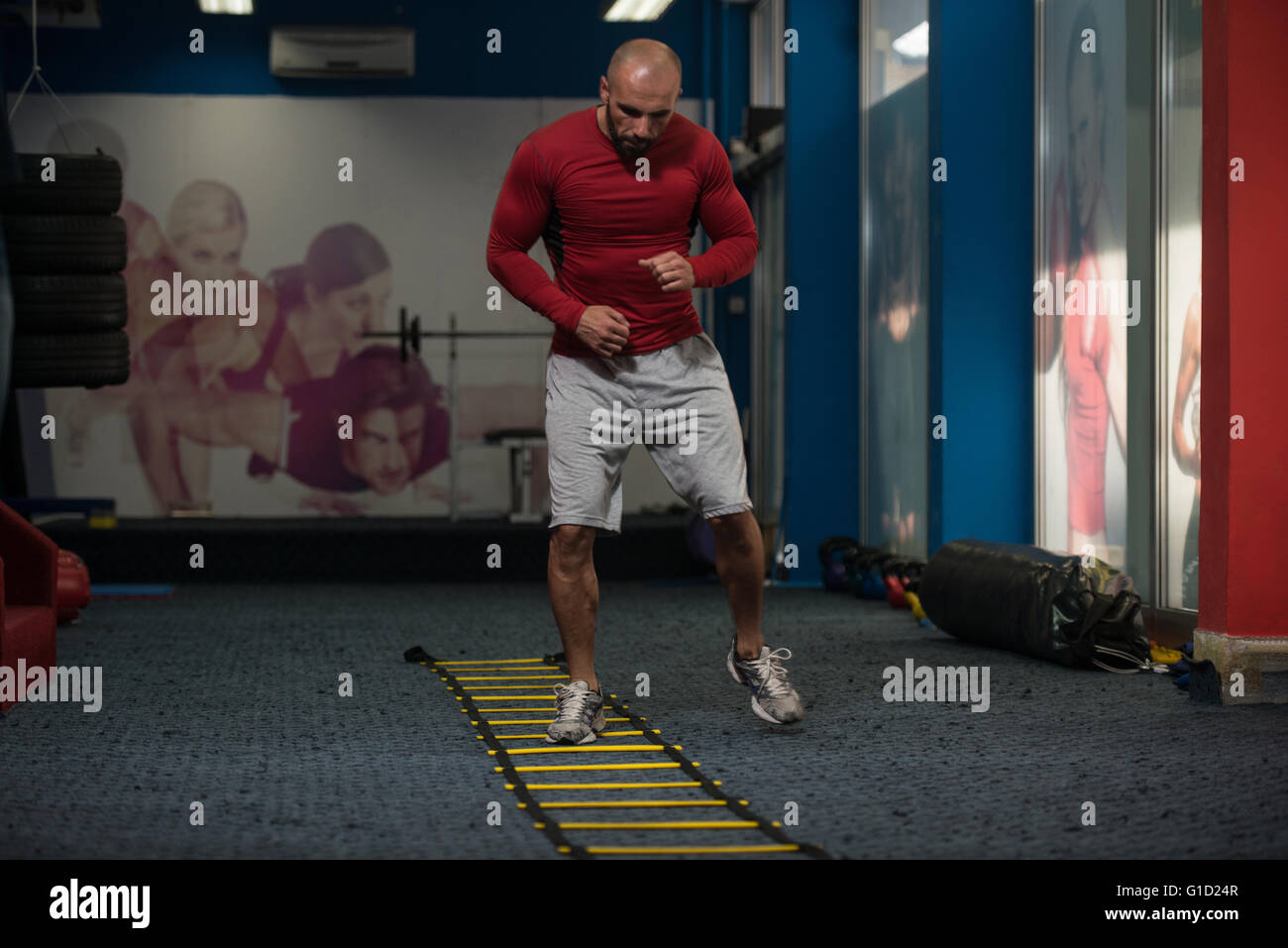 Handsome Man Running On Step Ladders Lying On Floor - Sports And ...