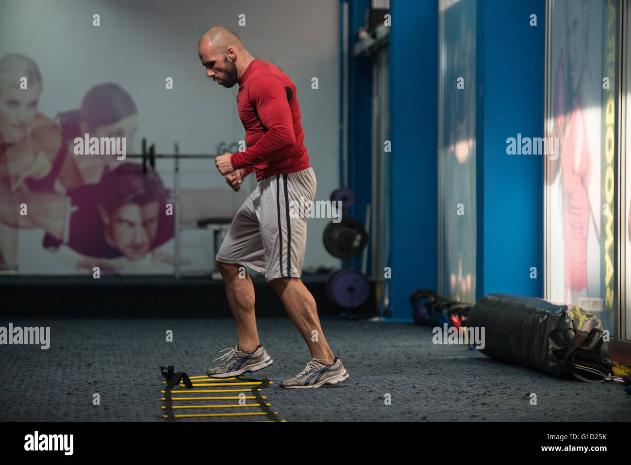 Handsome Man Running On Step Ladders Lying On Floor - Sports And ...
