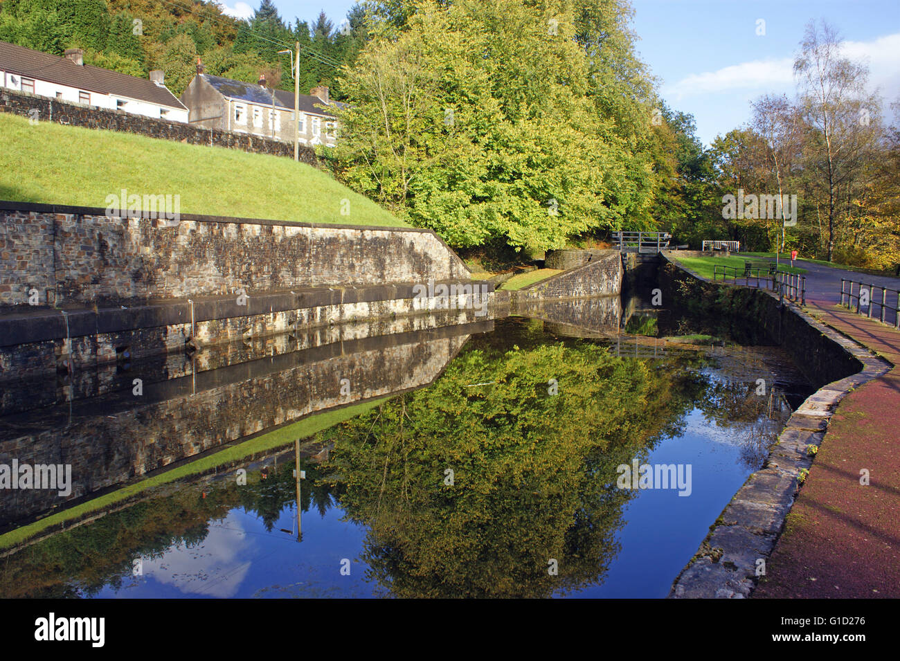 Neath Canals in Wales, near Swansea, small harbor, green trees and deep ...