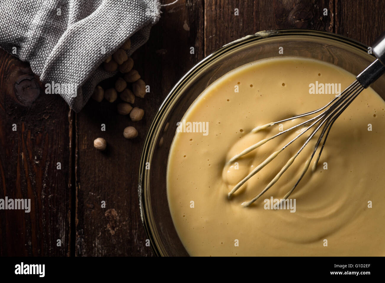 Chickpea Batter in a Bowl with a Whisk on Wood Stock Photo - Alamy