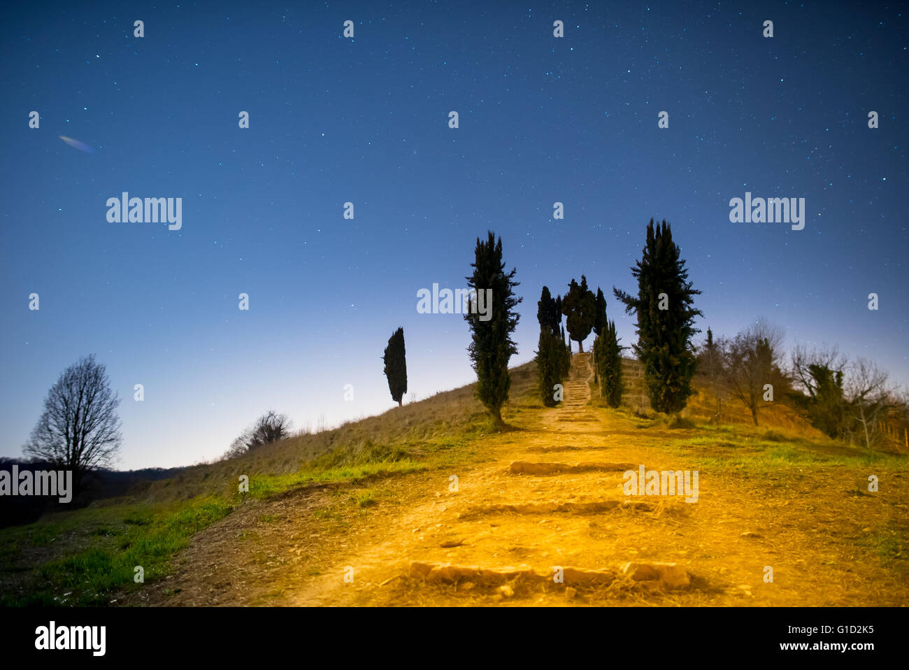 Starry night on the hill in Italy Stock Photo - Alamy