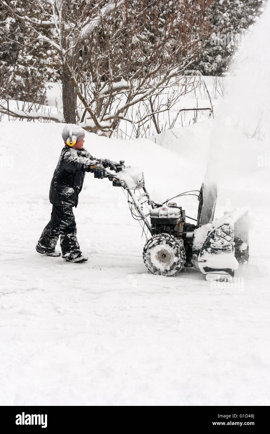 Manual snow clearing machine hi-res stock photography and images - Alamy