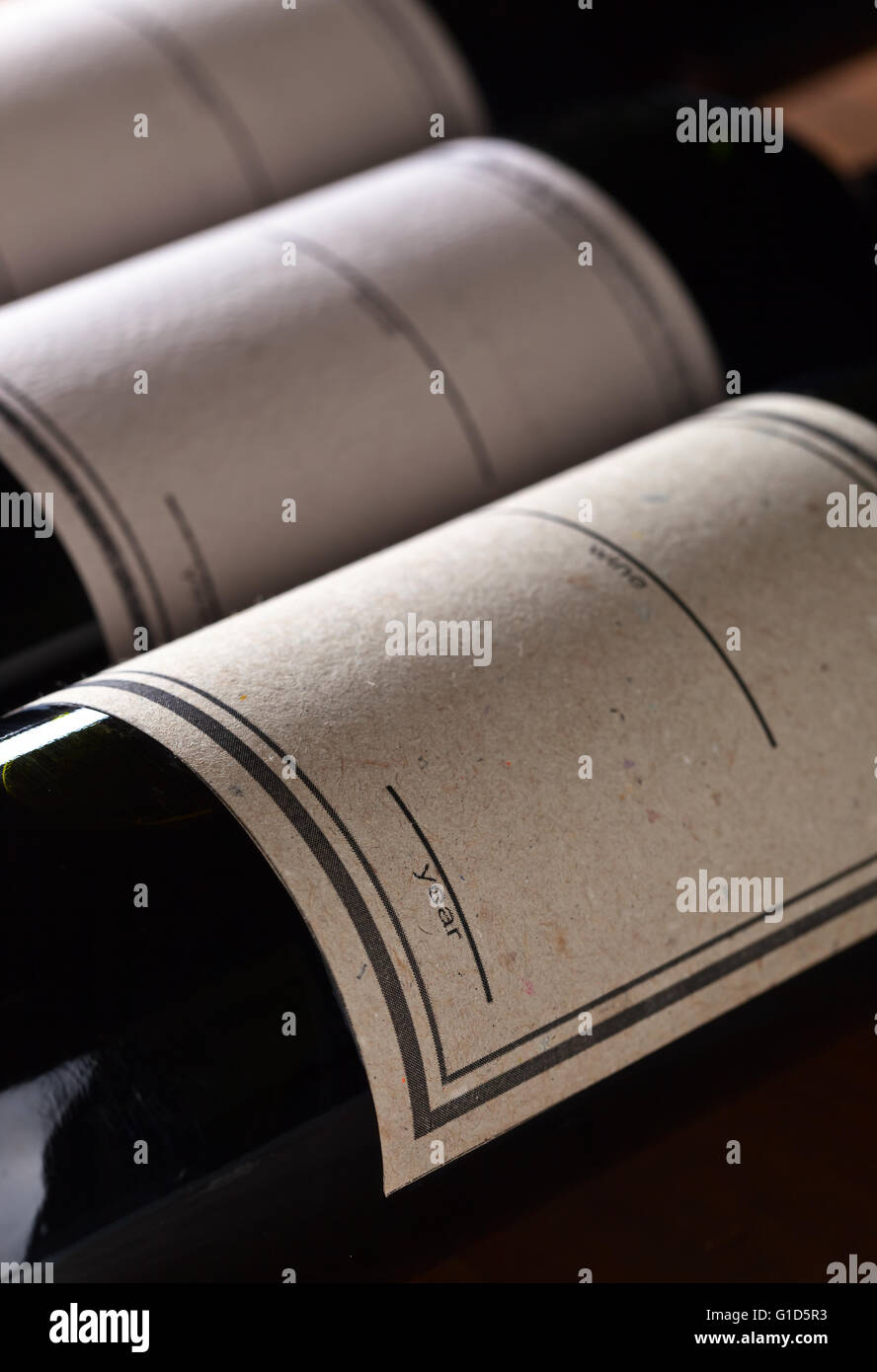 The bottles of red wine , focus on foreground Stock Photo - Alamy