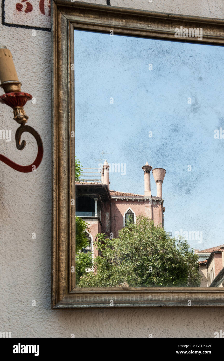 Venetian Rooftop reflected in exterior mirror Stock Photo - Alamy
