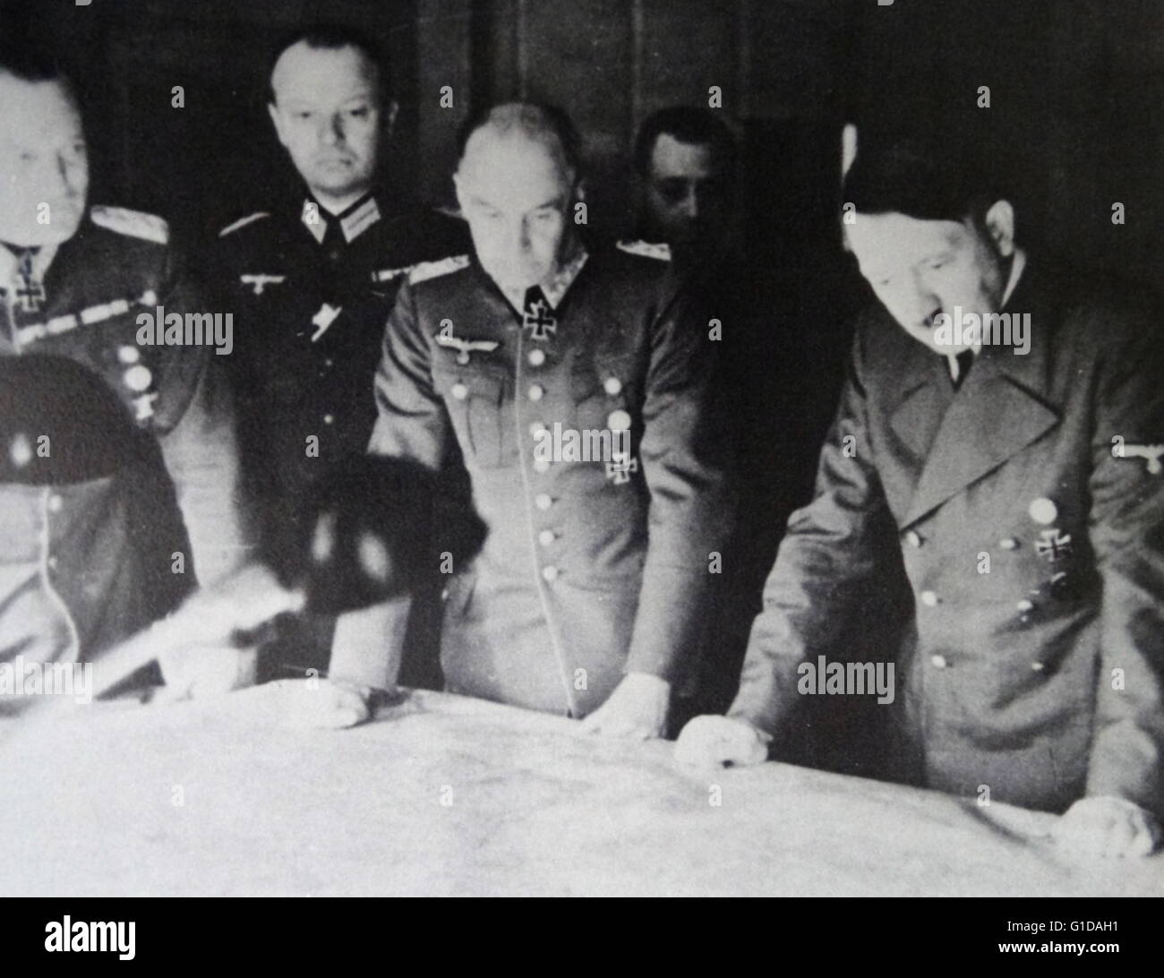 Adolf Hitler confers with General von Brauchitsch in the early years of ...