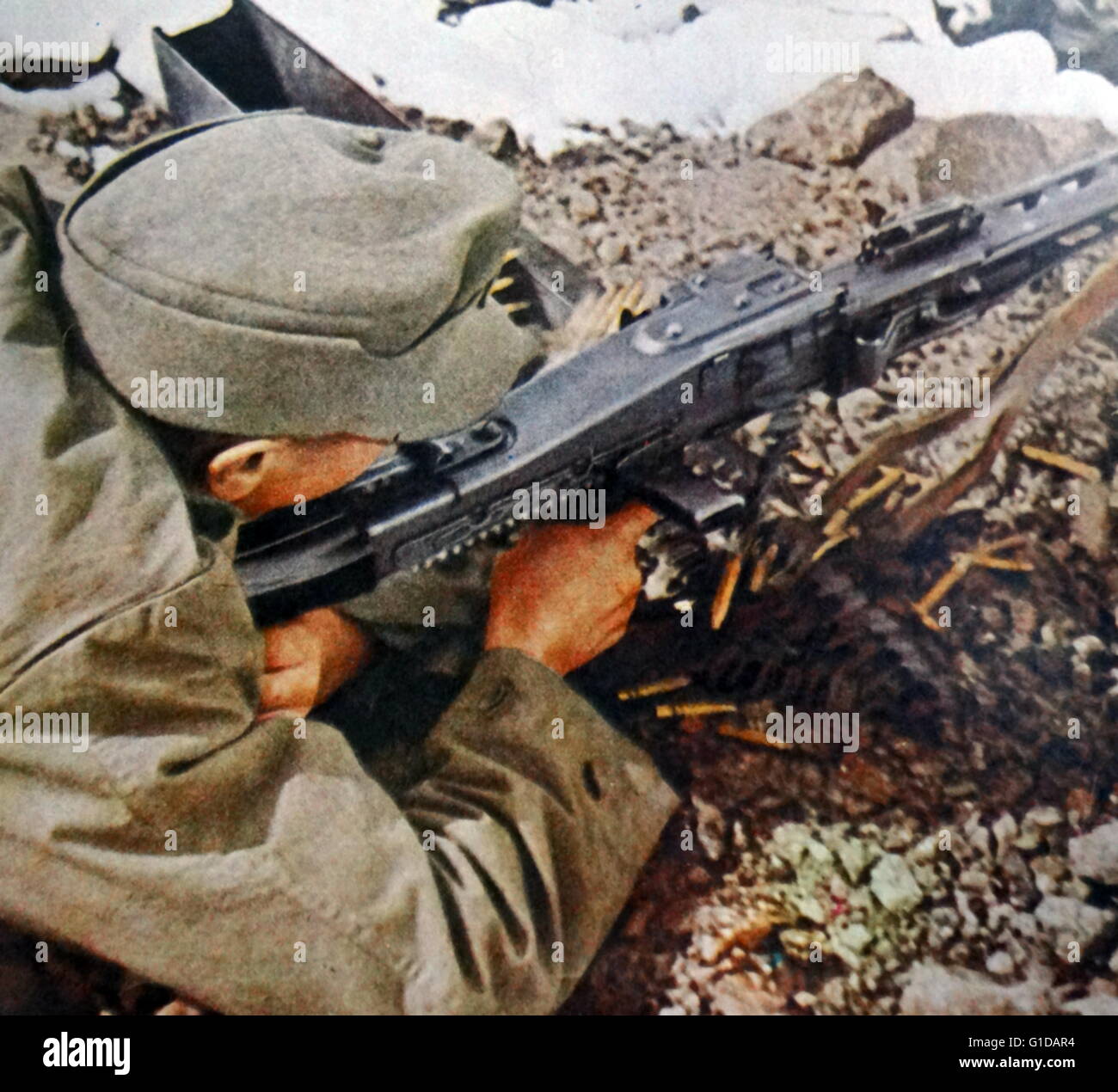 German soldier aiming a gun from the trenches in Russia. It was ...