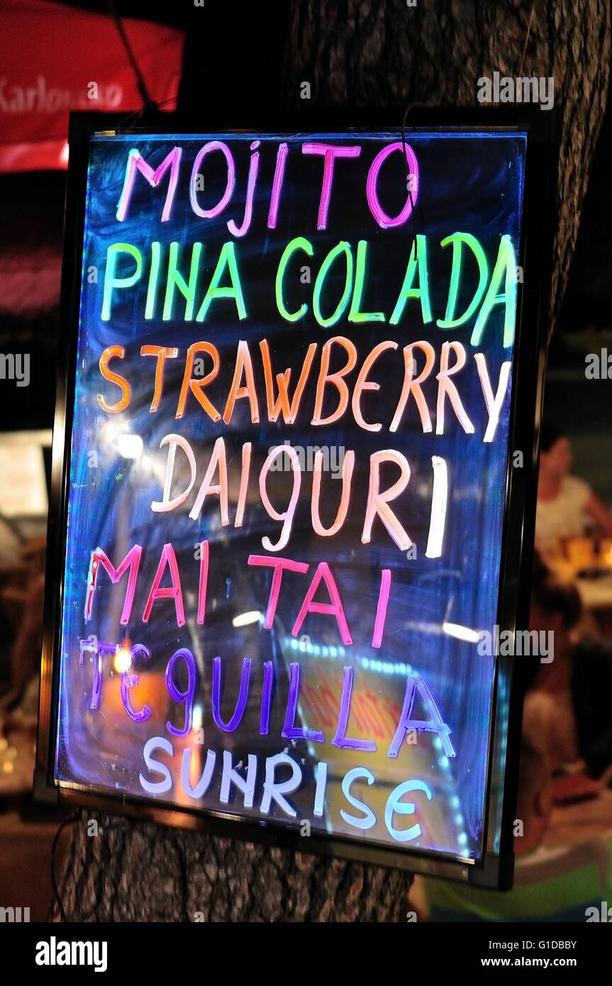 Set of cocktail menu with colorful neon lights in tropical cocktail bar ...