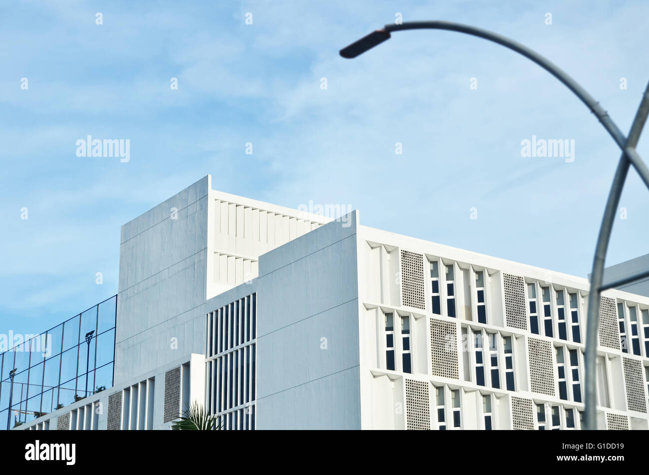 A corner roof of a white building Stock Photo - Alamy