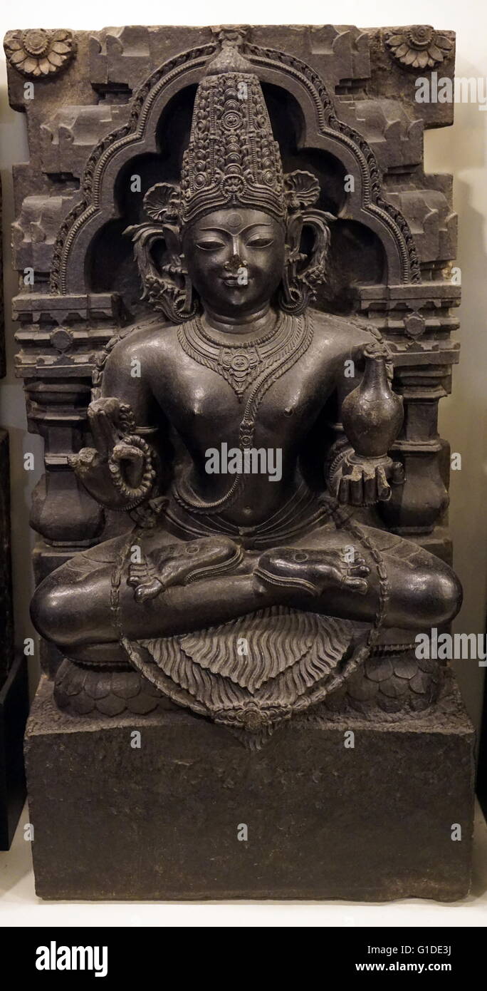 Sculpture of the Indian planet of the Mars (Mangala) holding a water ...