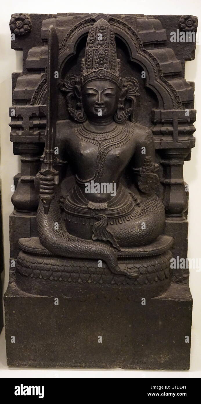 Sculpture of the Indian Ketu, with a serpent's tail, holding a sword ...