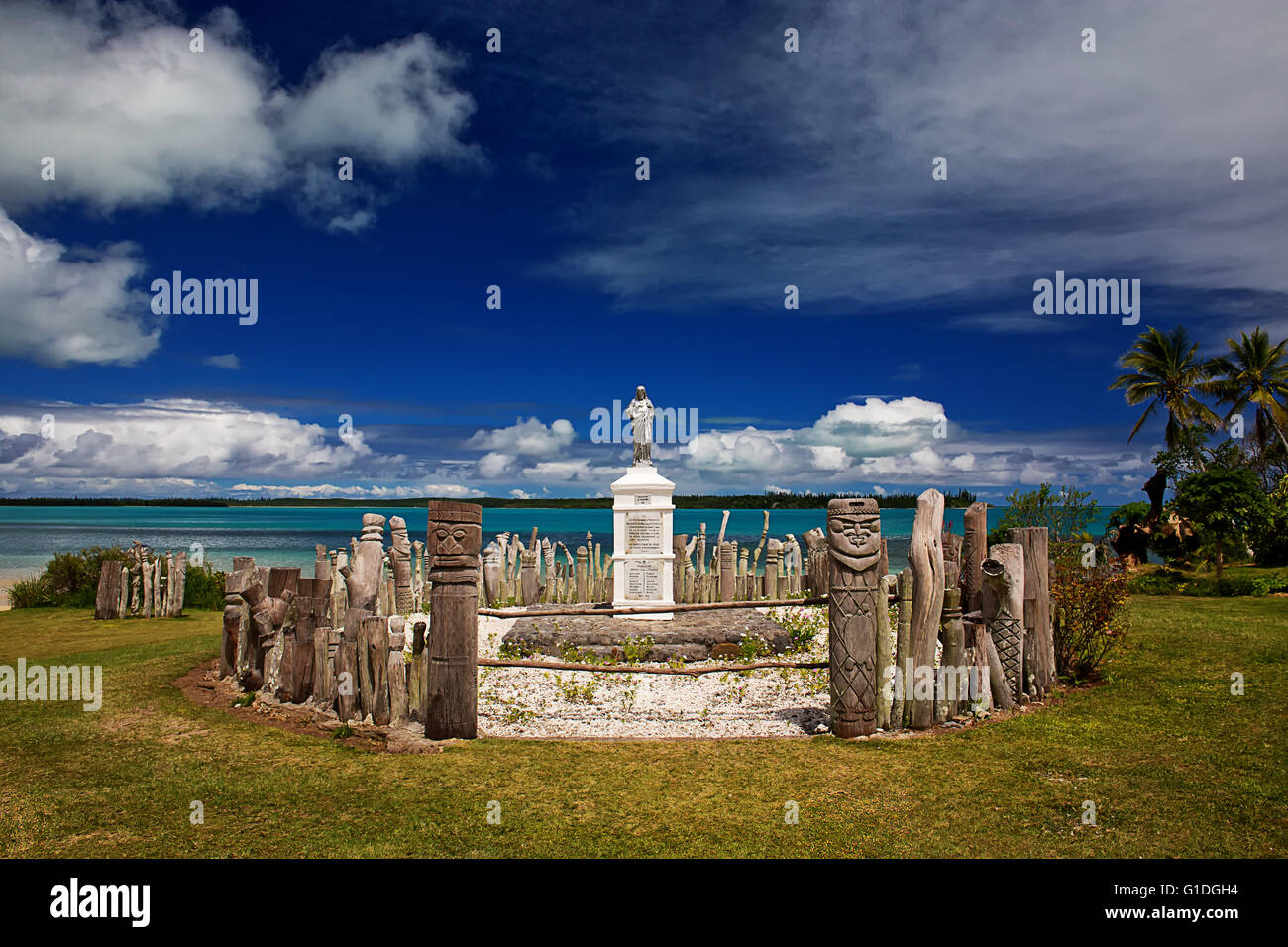 Carved totems and statue commemorating European Missionaries on Isle Of ...