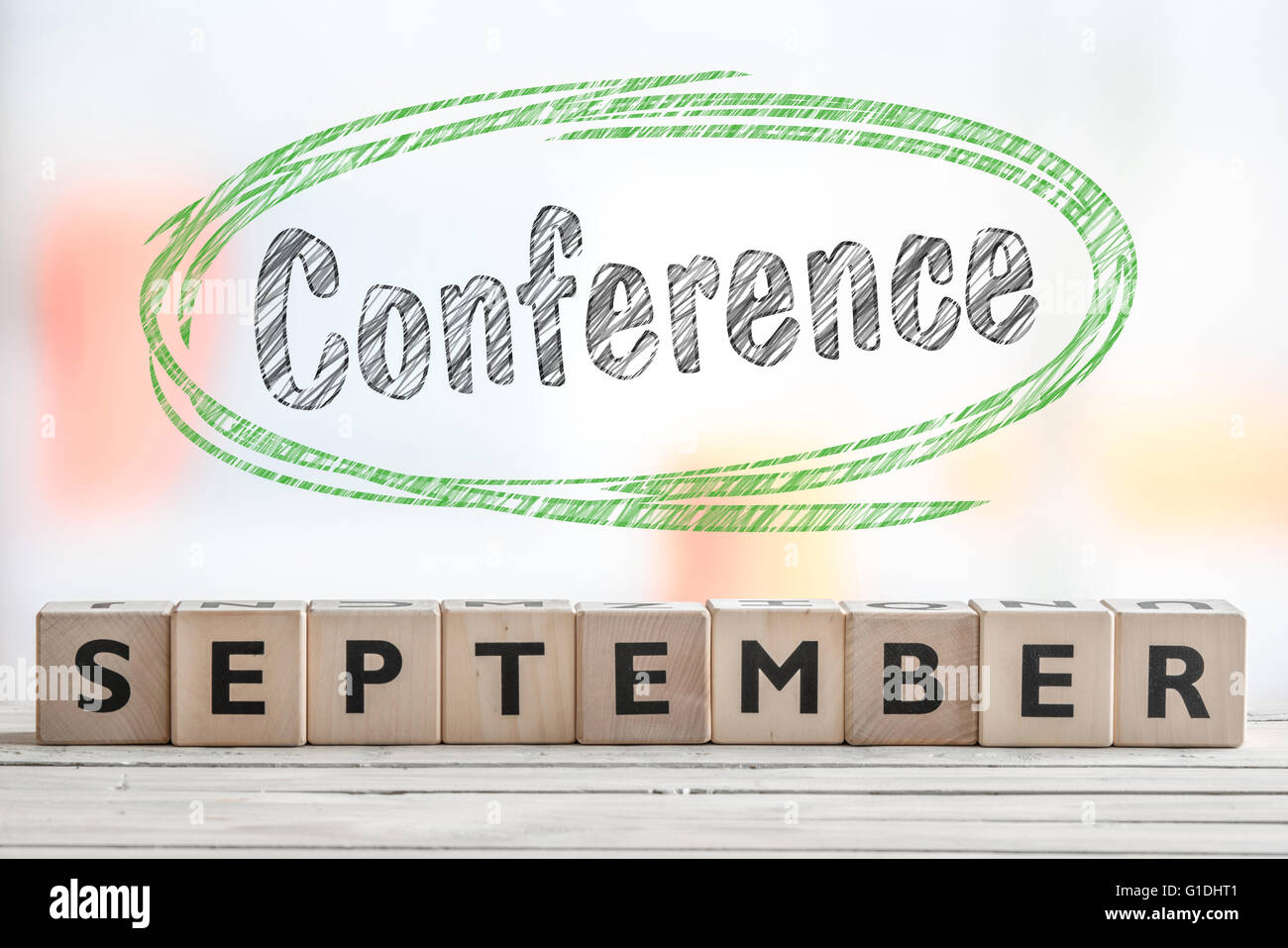 September conference sign with green sketch on a wooden stage Stock ...