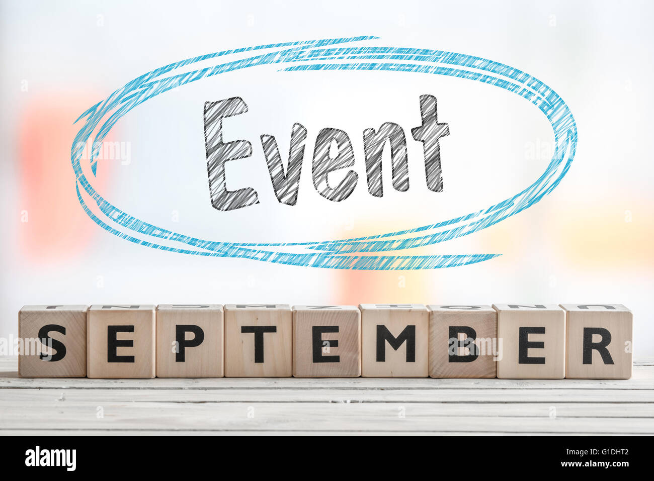 September event sign with blue sketch on a wooden stage Stock Photo - Alamy