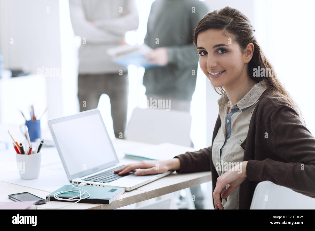Girl in a library on laptop hi-res stock photography and images - Alamy
