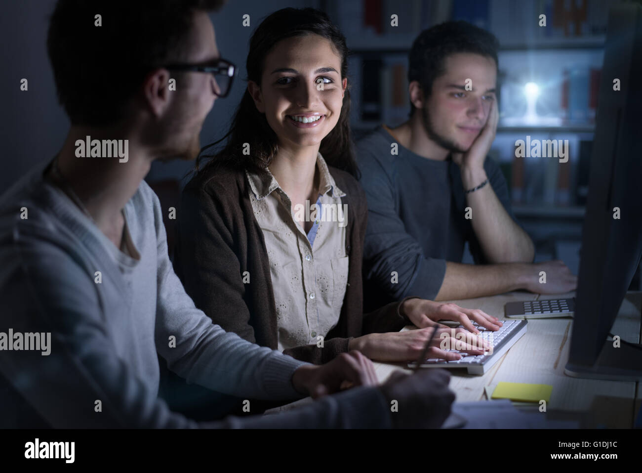 Teenager using computer at night hi-res stock photography and images ...