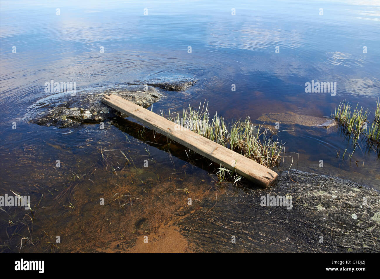 a plank over the water Stock Photo - Alamy