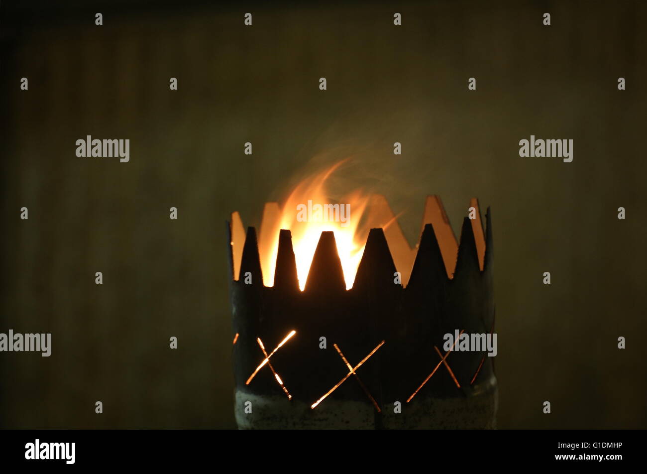 Flame in a serrated goblet Stock Photo - Alamy