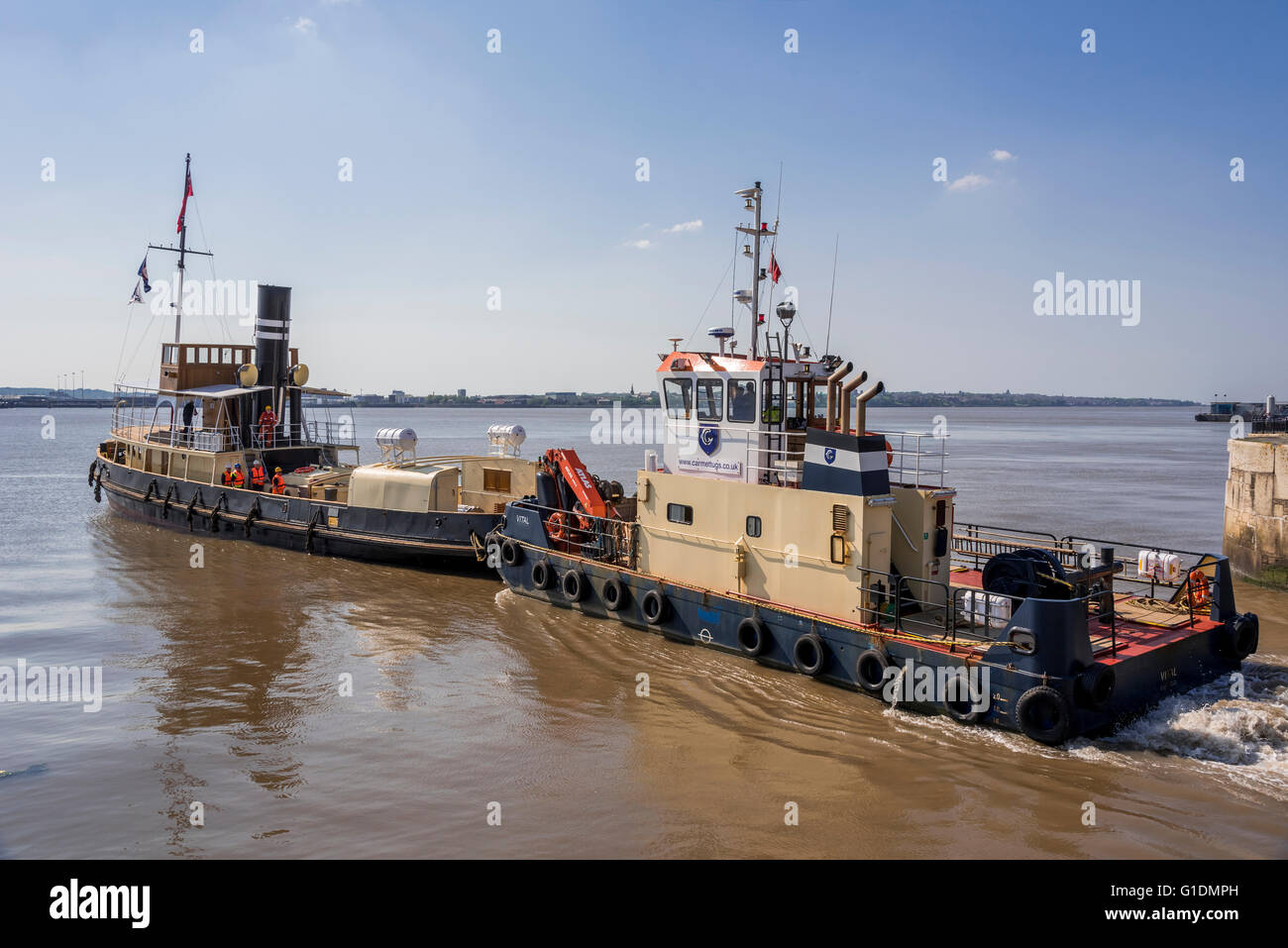 Steam tug and tender the Daniel Adamson leaves the Canning Dock at ...