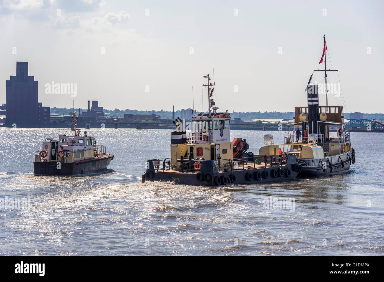 Steam tug and tender the Daniel Adamson leaves the Canning Dock at ...