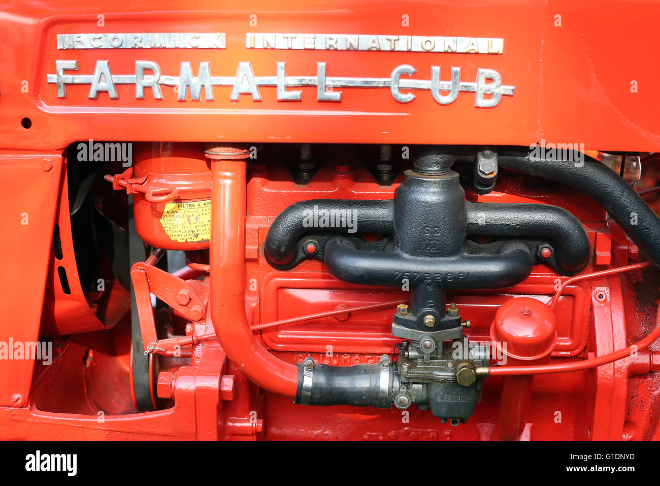 Vintage red tractor. Mc Cormick Farmall Cub. Servoz. France Stock Photo ...