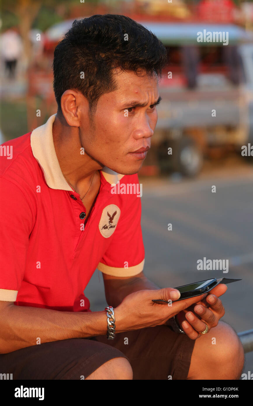 Man using a mobile phone. Vientiane. Laos Stock Photo - Alamy