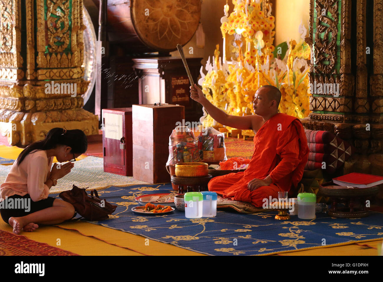 Wat Si Muang ( Simuong) buddhist temple. Buddhist ceremony. Monk ...