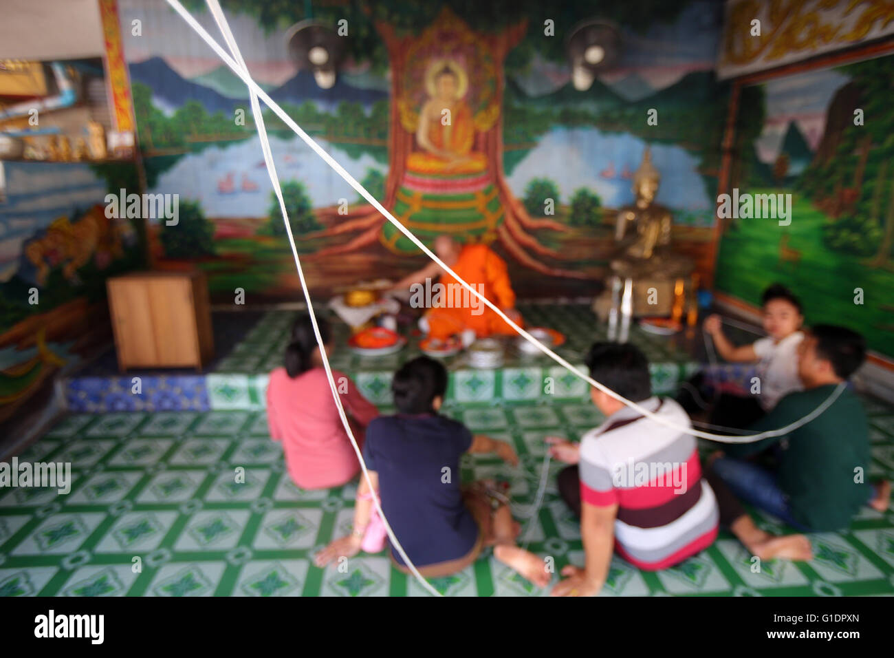 Wat Si Muang ( Simuong) buddhist temple. Buddhist ceremony. Sai-sin and ...