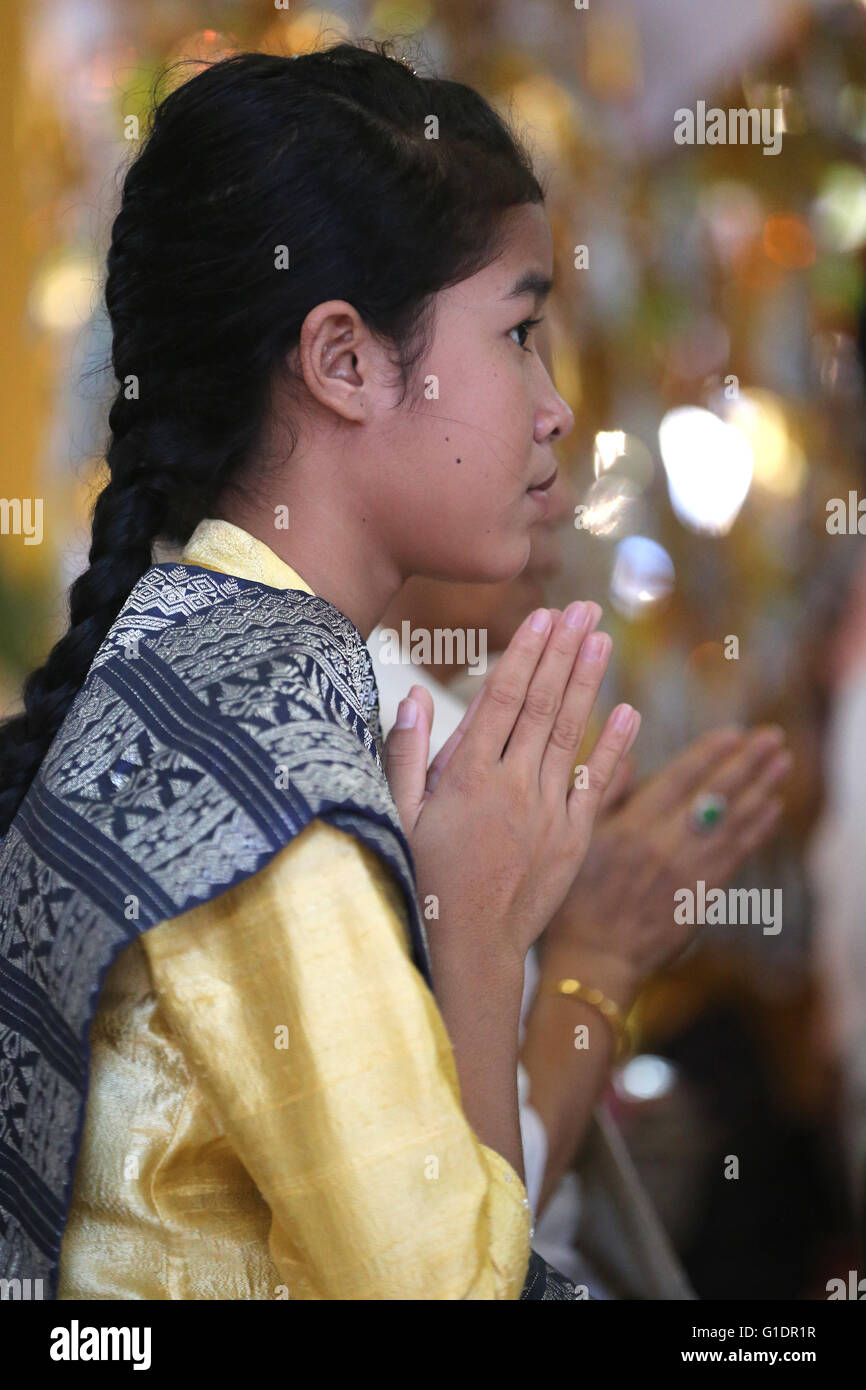 Wat Si Muang ( Simuong) buddhist temple. Buddhist ceremony. Girl ...