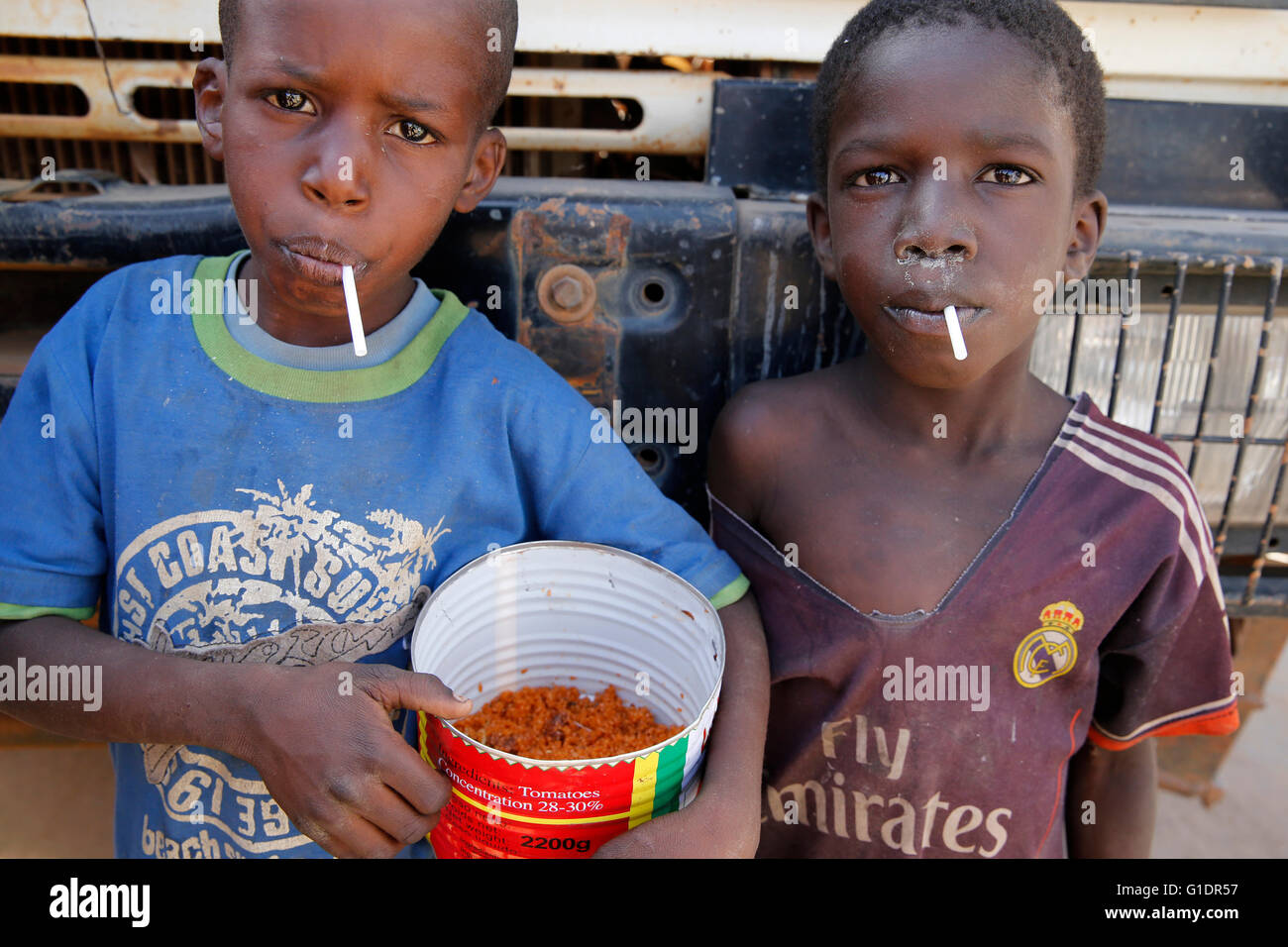 Talibes with lollipops and alm box. Richard Toll. Senegal Stock Photo ...