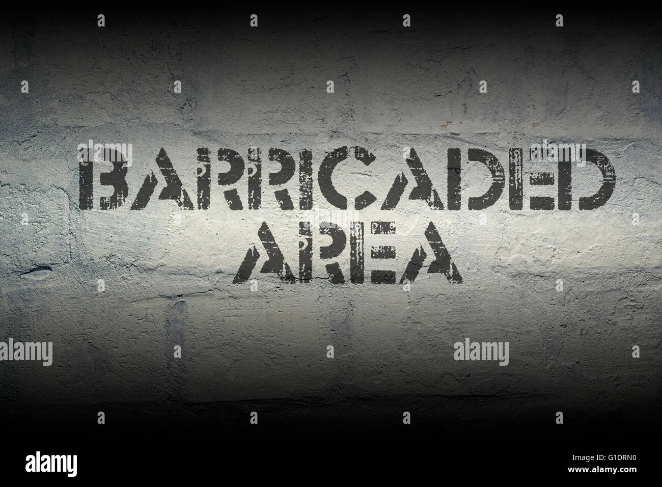 barricaded area stencil print on the grunge white brick wall Stock ...