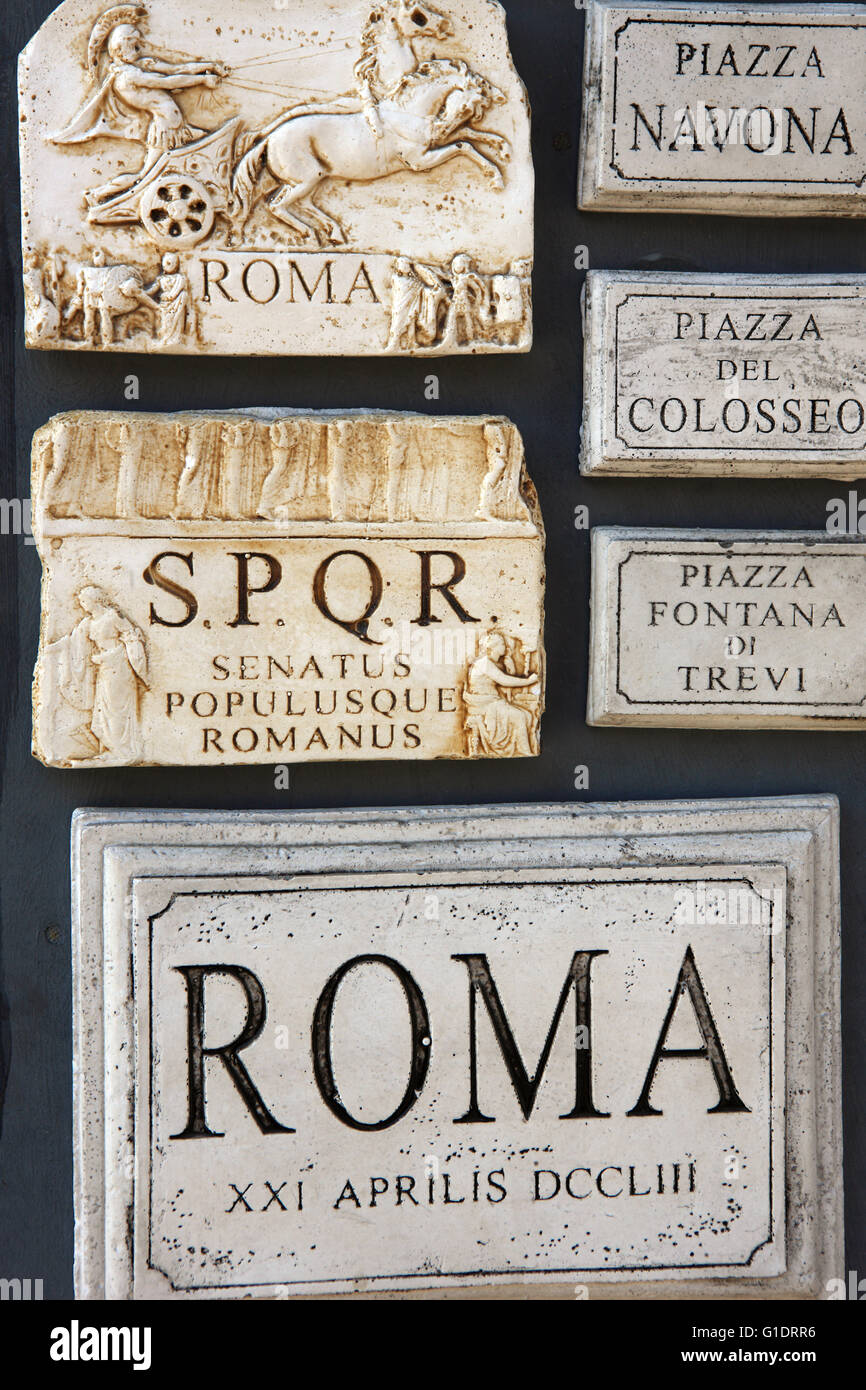 Roman replica souvenir plaques for tourists Stock Photo - Alamy