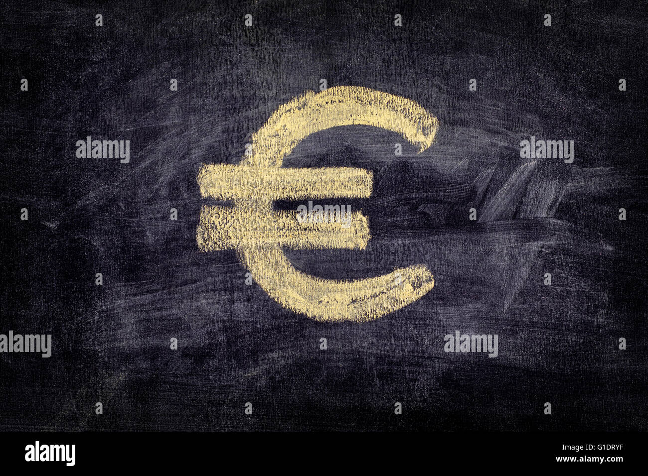 Drawn euro sign on black chalkboard background. Close up Stock Photo ...