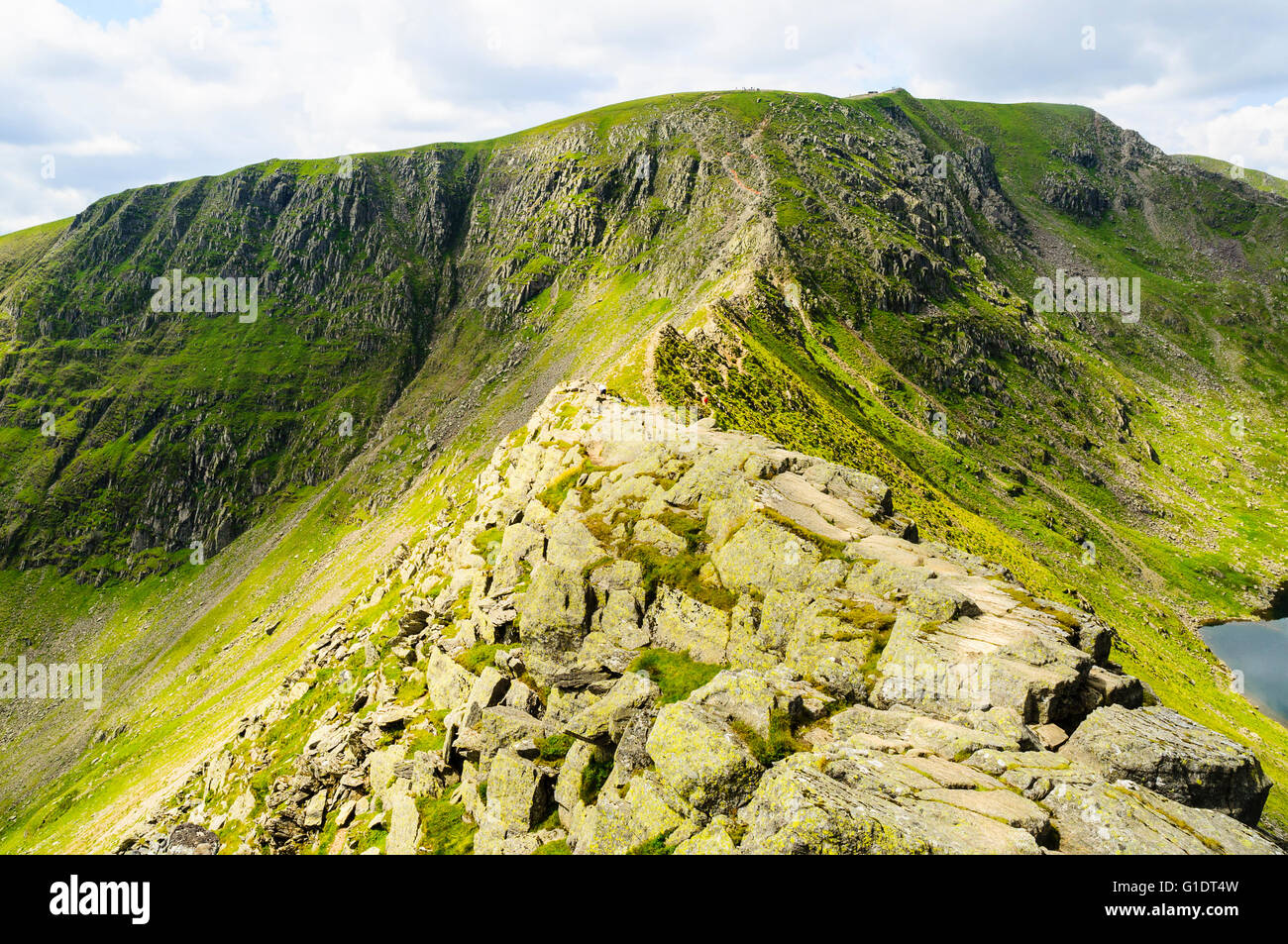 Looking along Striding Edge towards Helvellyn in the Lake District ...