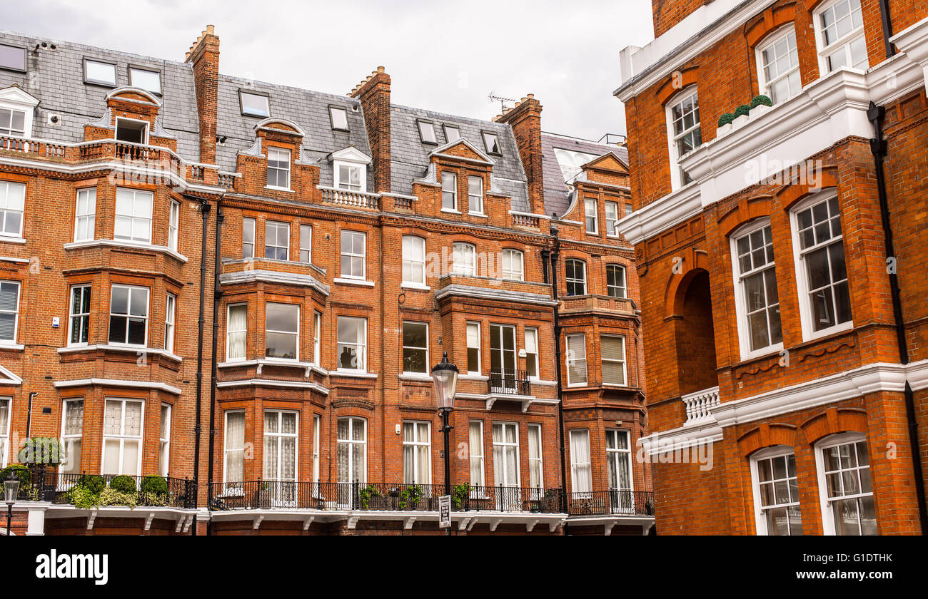 Facade of opulent British Victorian Edwardian terraced flat in red ...
