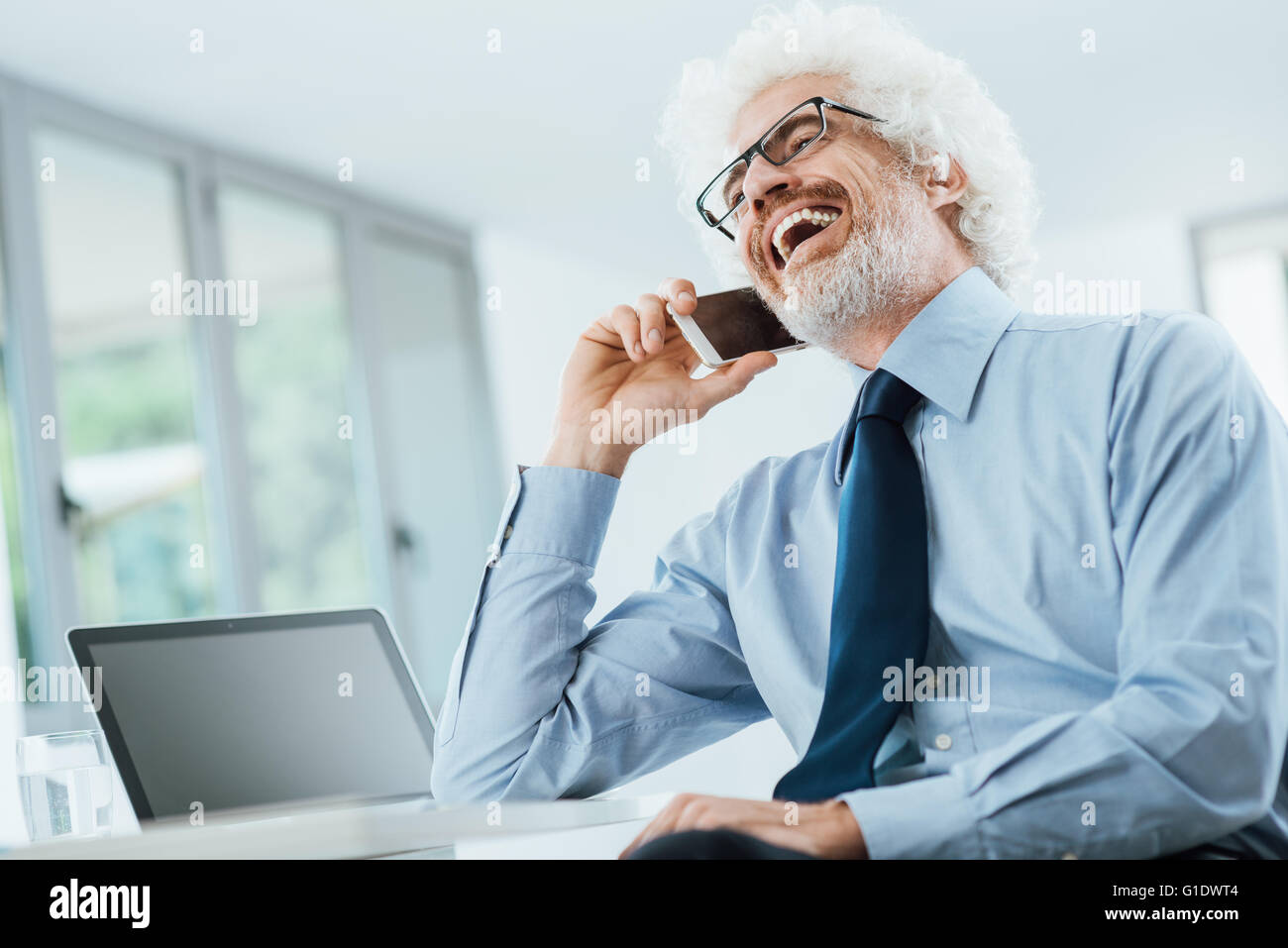 Laughing office interior hi-res stock photography and images - Alamy