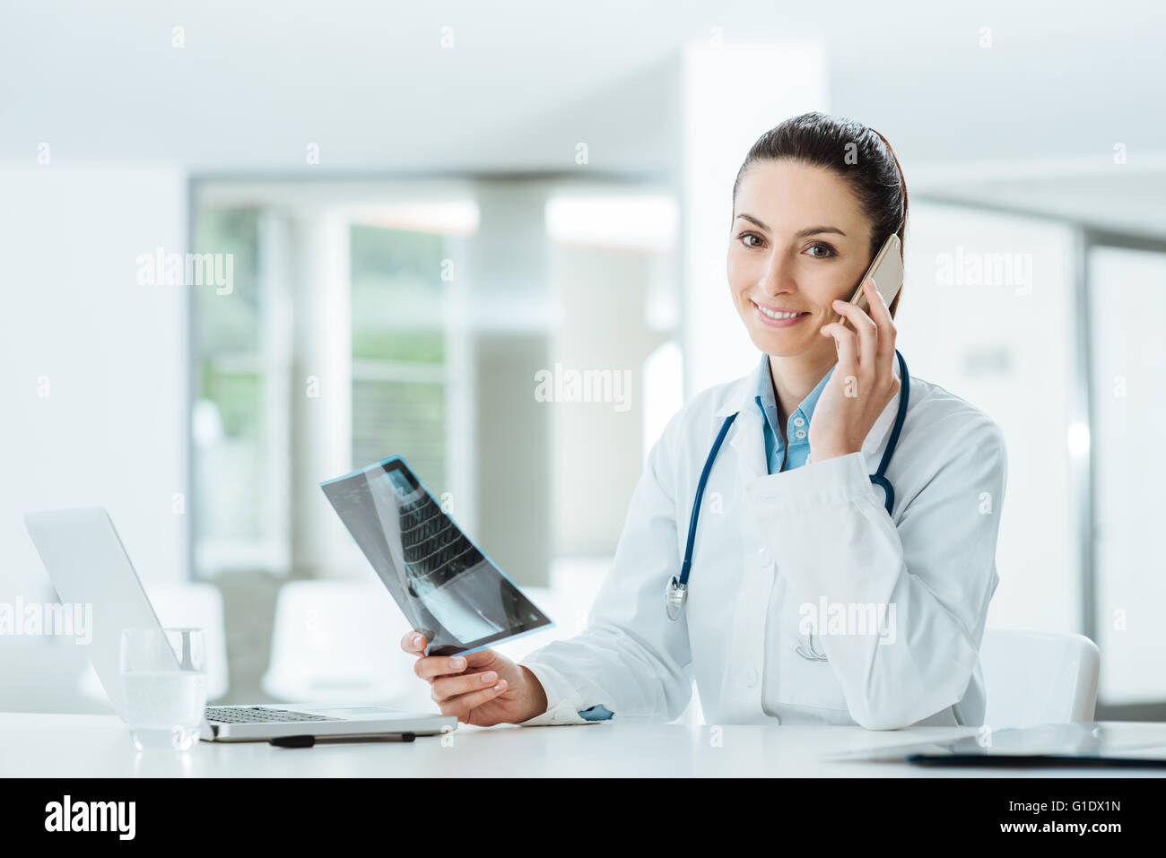 Doctor calling patient hi-res stock photography and images - Alamy