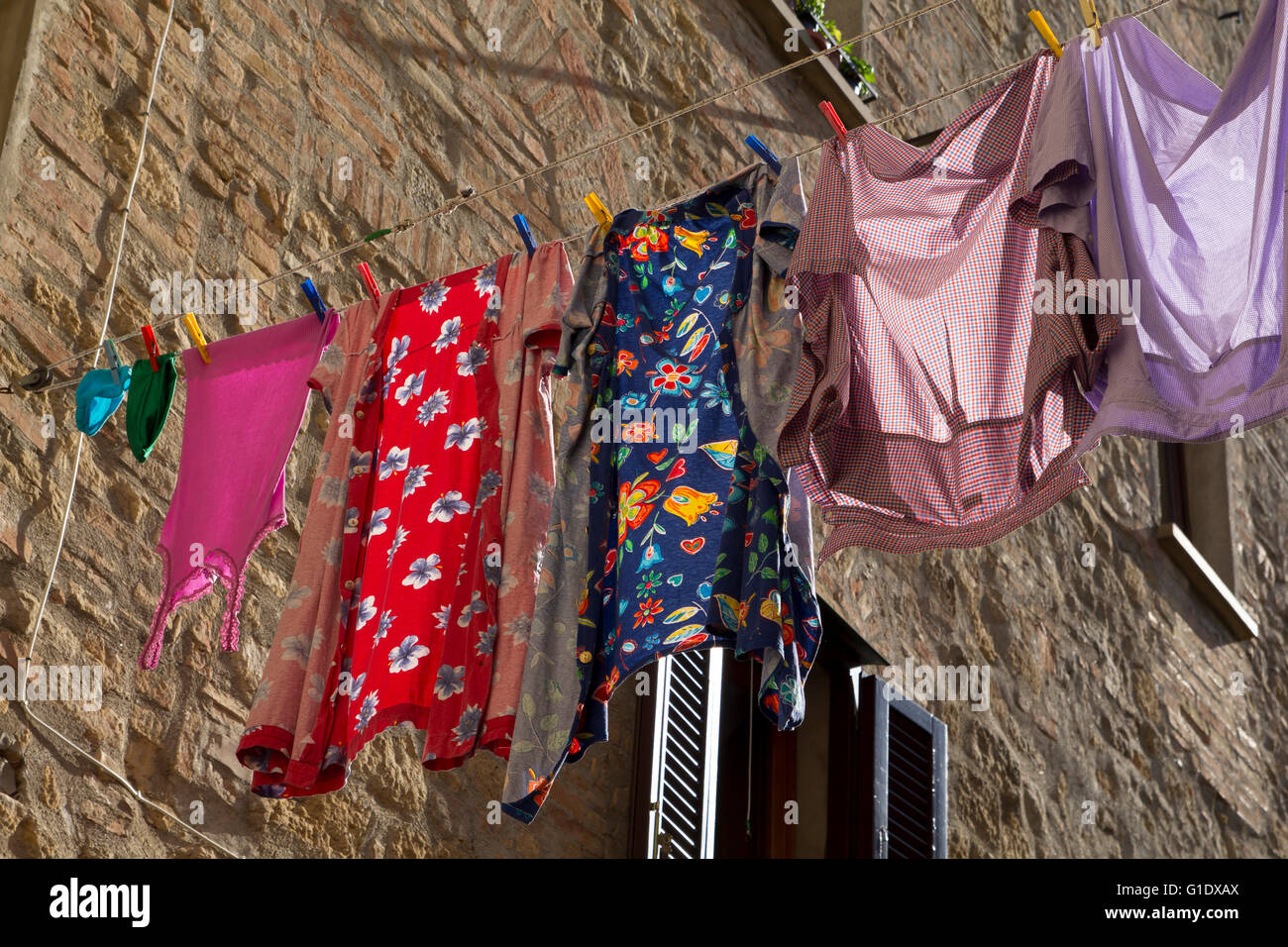 Hanging clothes hi-res stock photography and images - Alamy