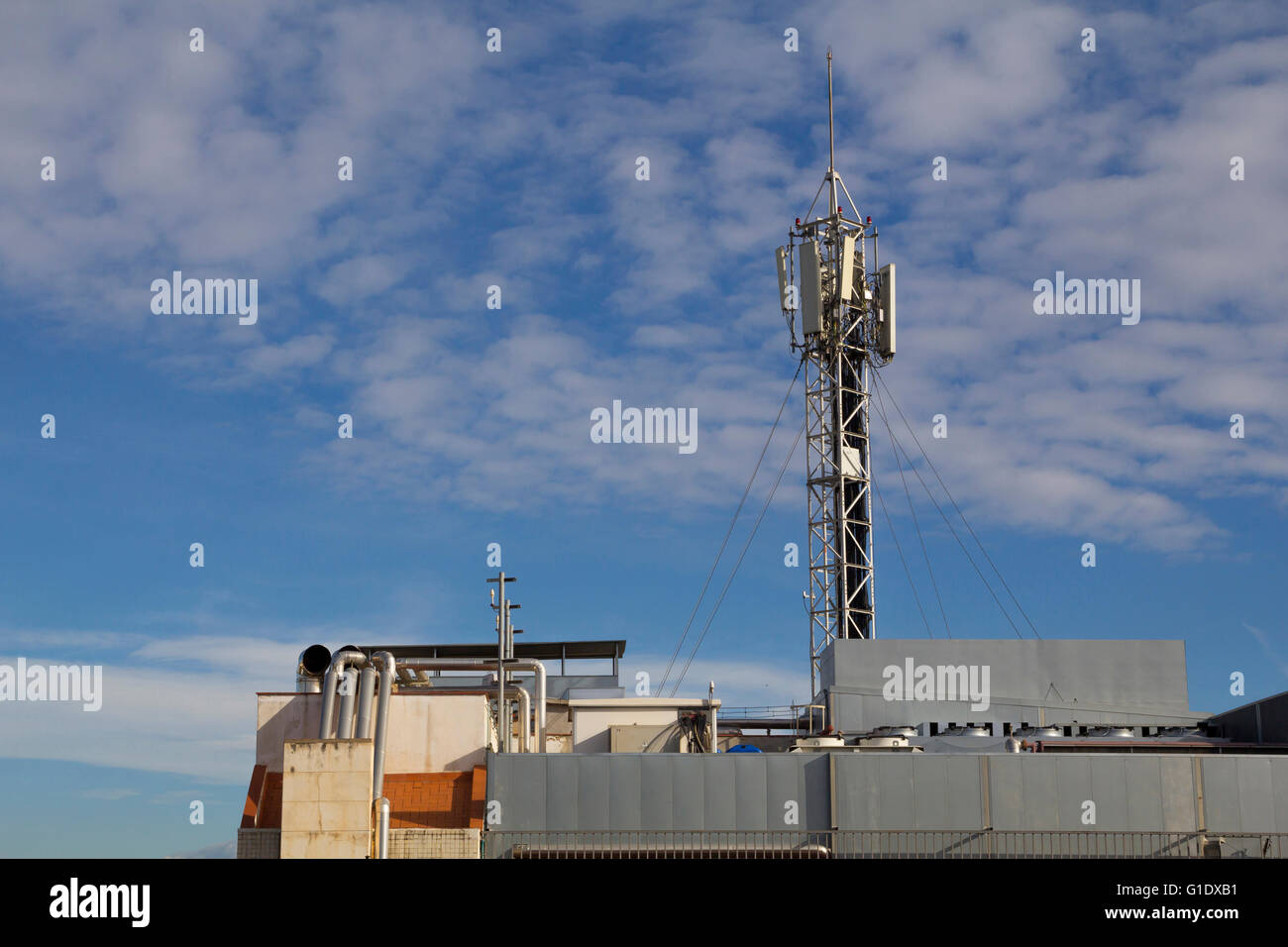 Mobile antenna in a roof top of a building Stock Photo - Alamy